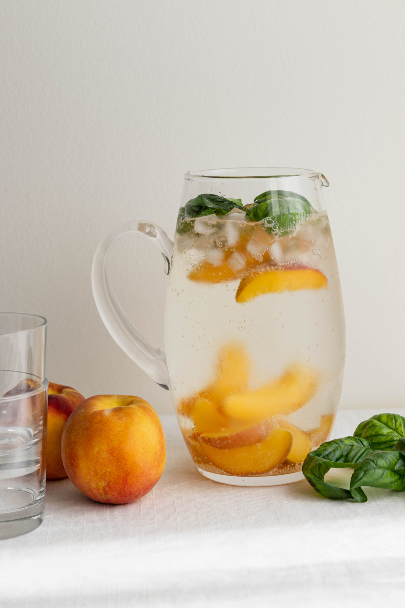 Easy Sparkling Peach Basil Mocktail Recipe - MAY EIGHTY FIVE