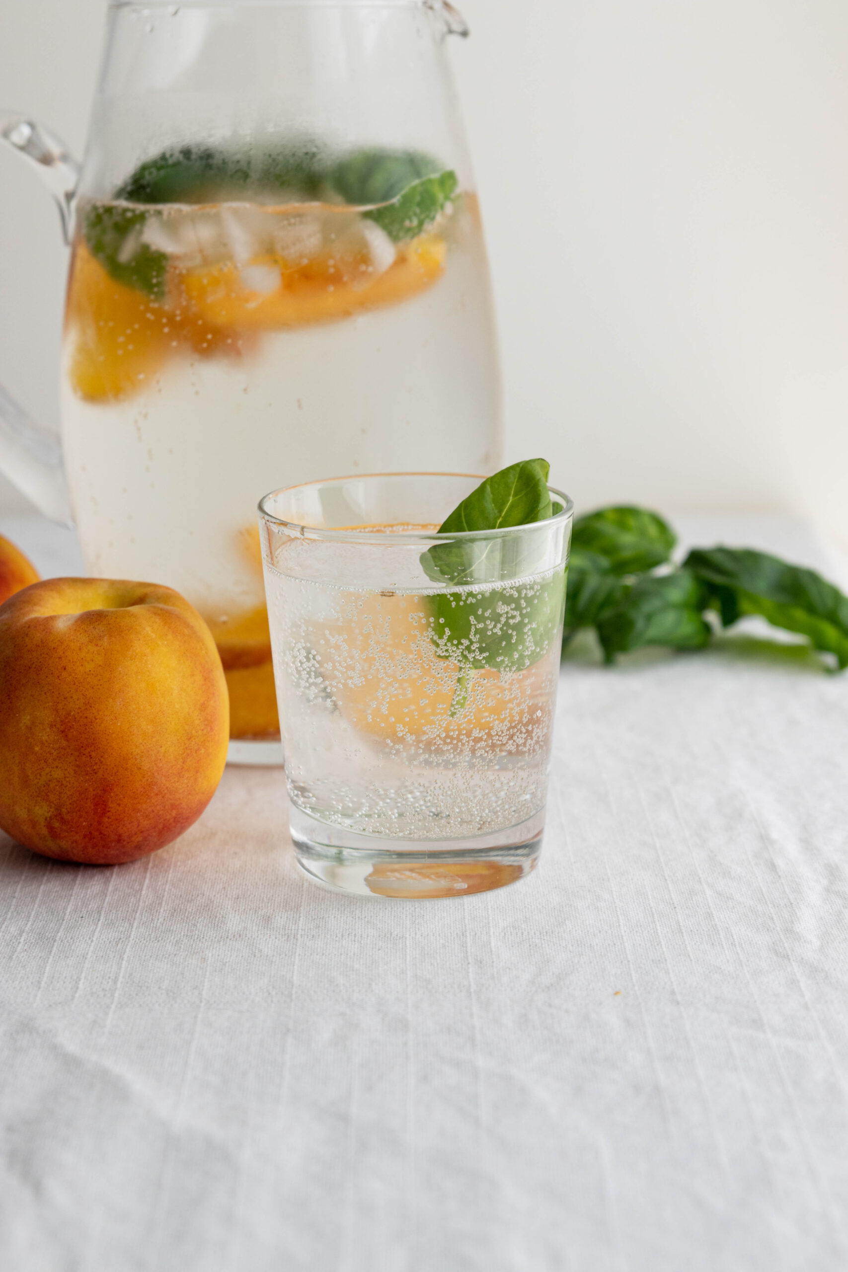 Easy Sparkling Peach Basil Mocktail Recipe - MAY EIGHTY FIVE